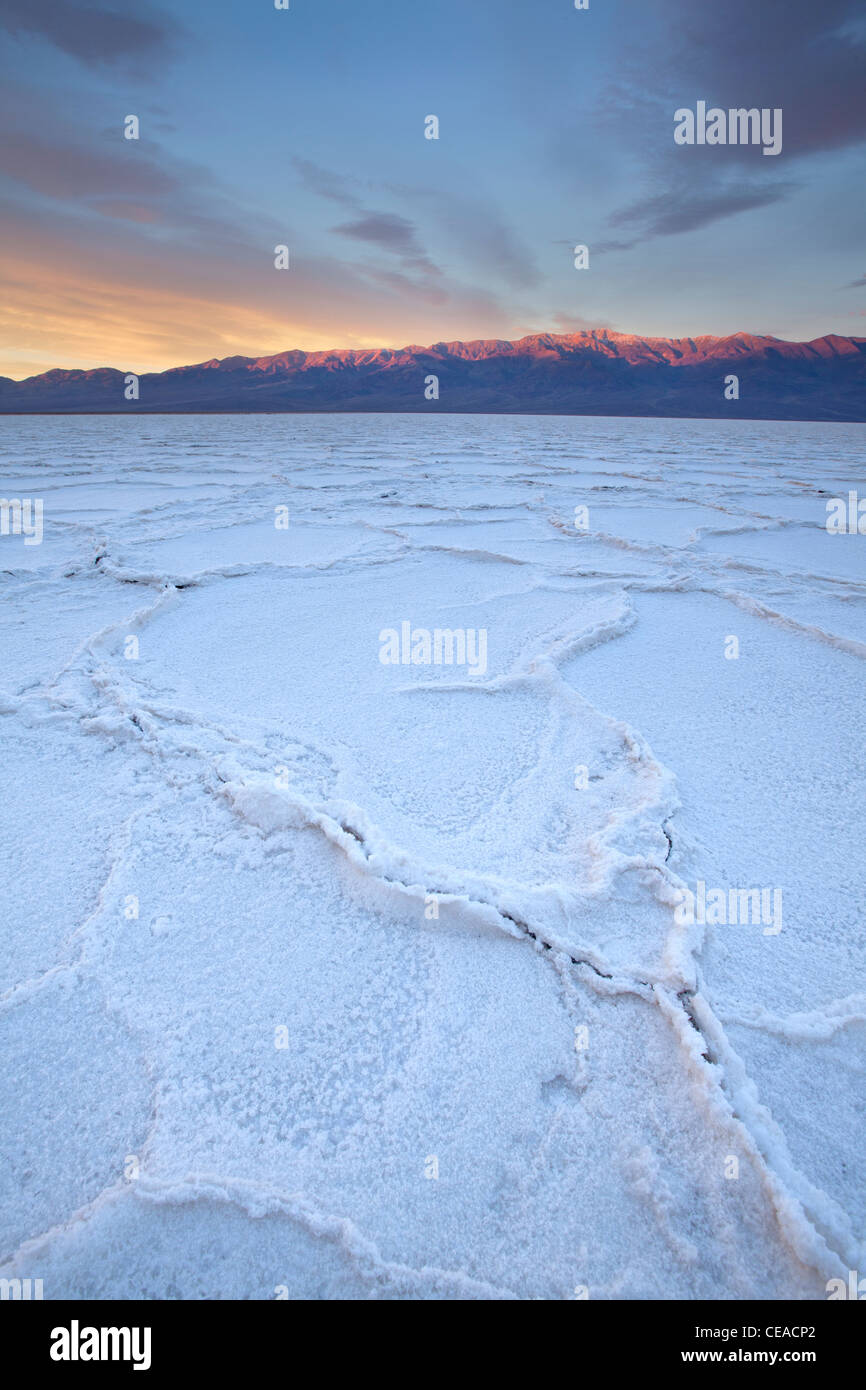 Sunrise over salt polygons and patterns at Badwater Salt Flats in Death ...