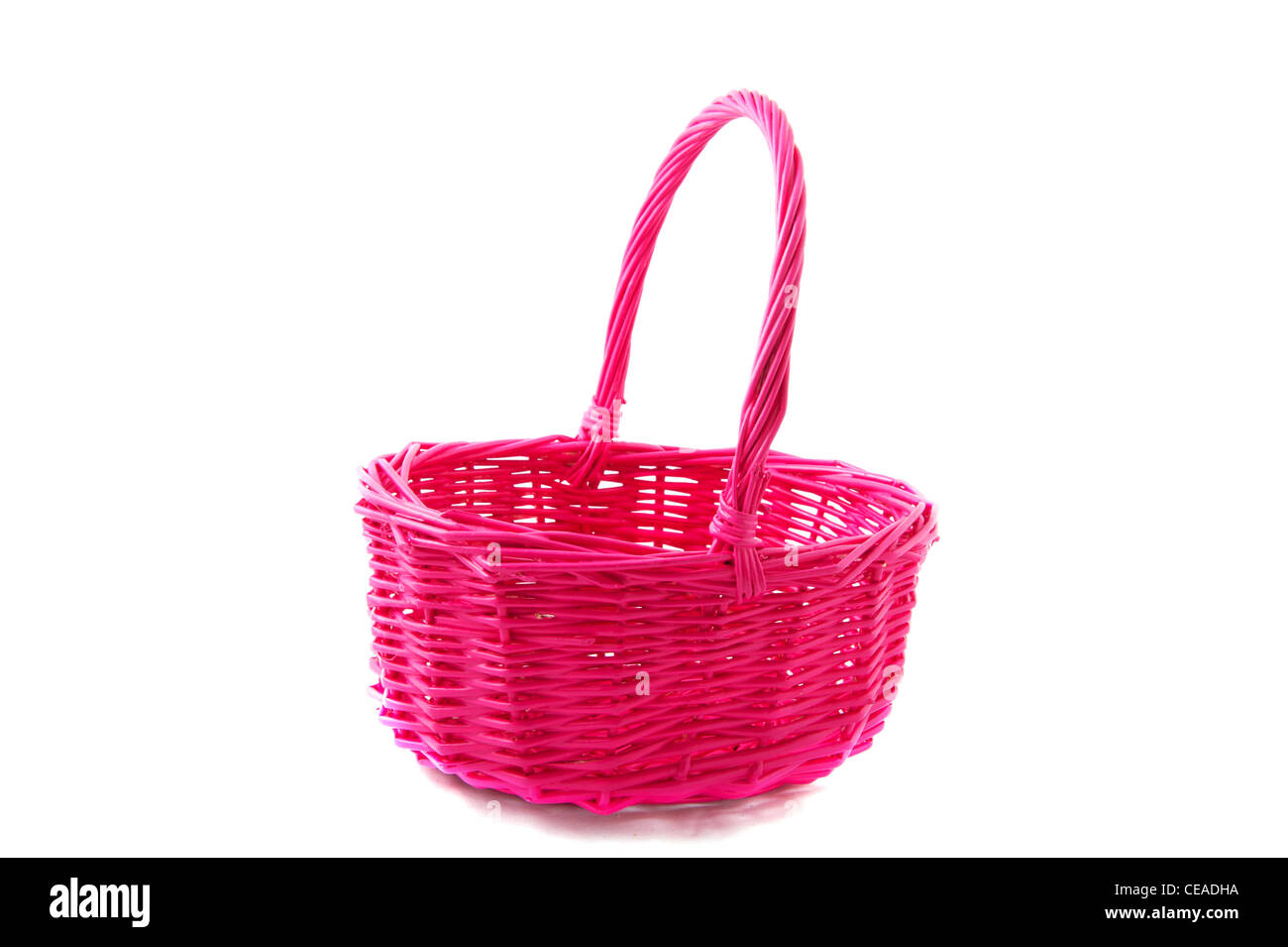 Empty pink wicker basket isolated over white background Stock Photo - Alamy
