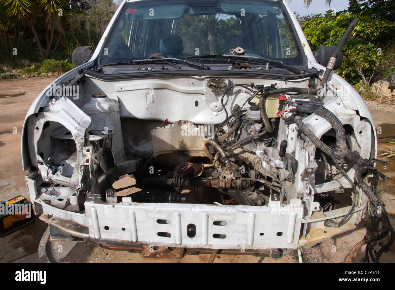 motor ripped out in broken car Stock Photo - Alamy