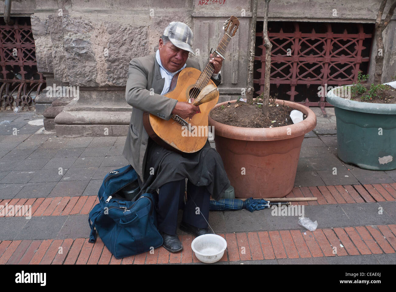 A 50 60 Year Old Blind Male Musician Plays His Guitar And Strums It