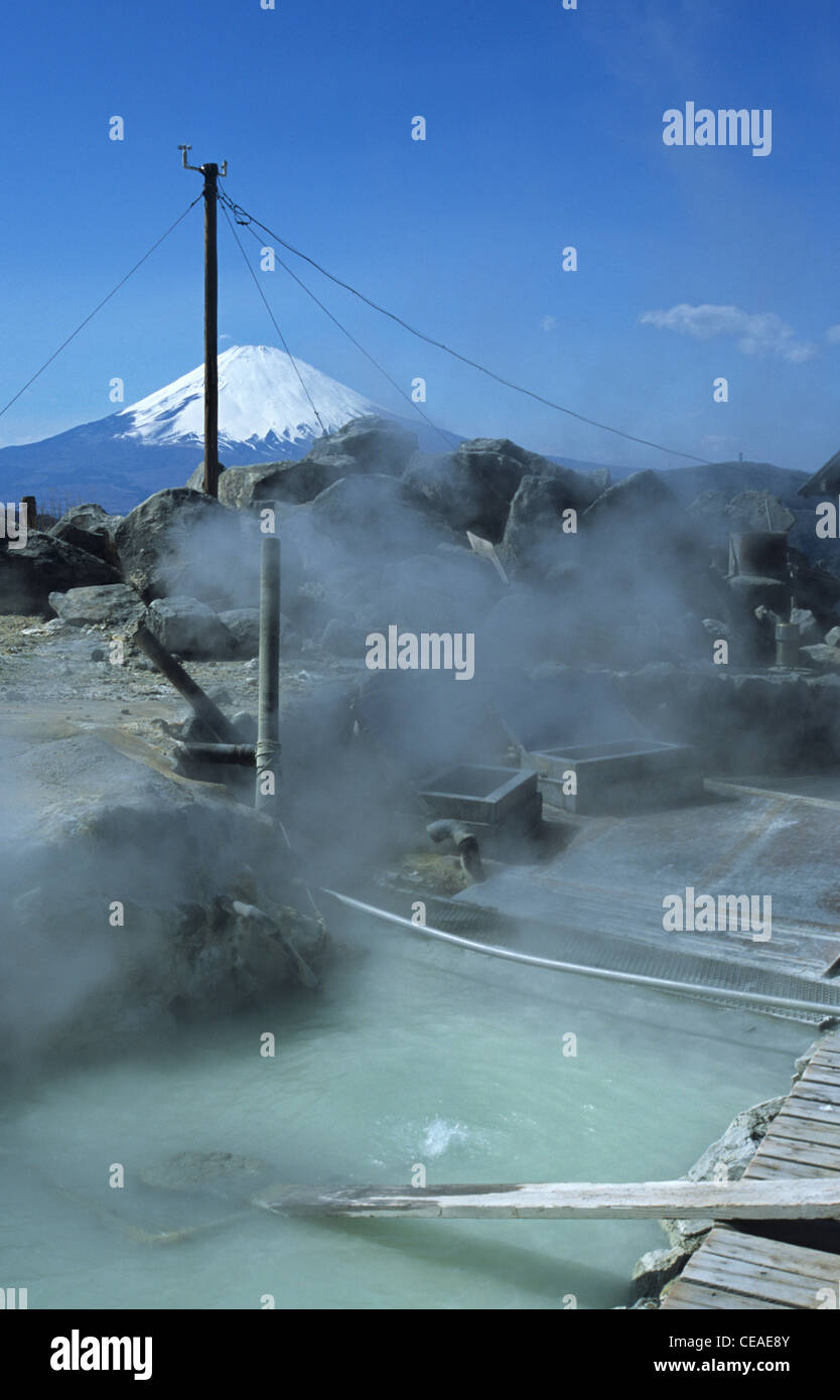 Sulphur hot springs with snow-capped Mount Fuji in the background ...