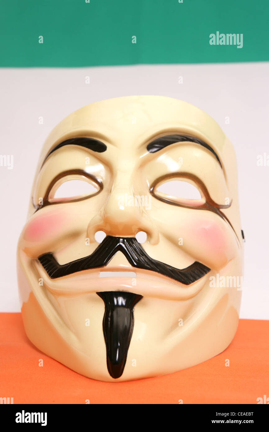 Guy fawkes mask on irish flag Stock Photo - Alamy