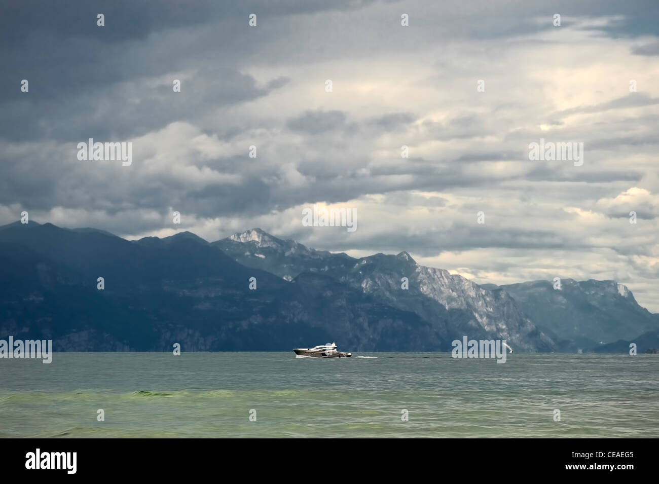 Small yacht dwarfed hi-res stock photography and images - Alamy