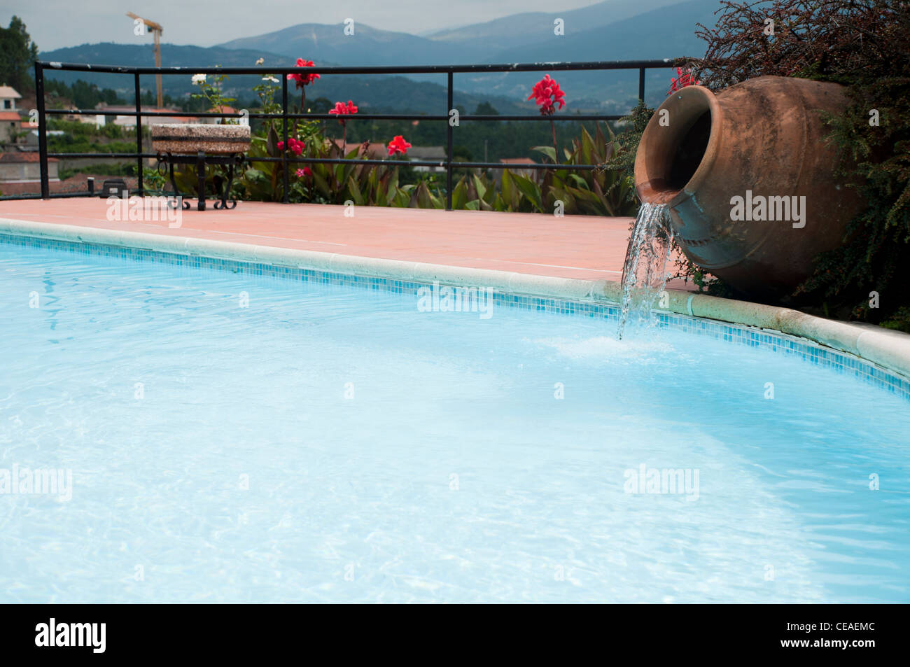 Swimming pool cascade Stock Photo - Alamy