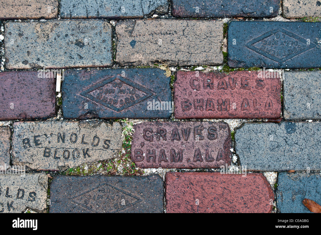 Old brick used as sidewalk stones with signs, St Augustine, Florida ...