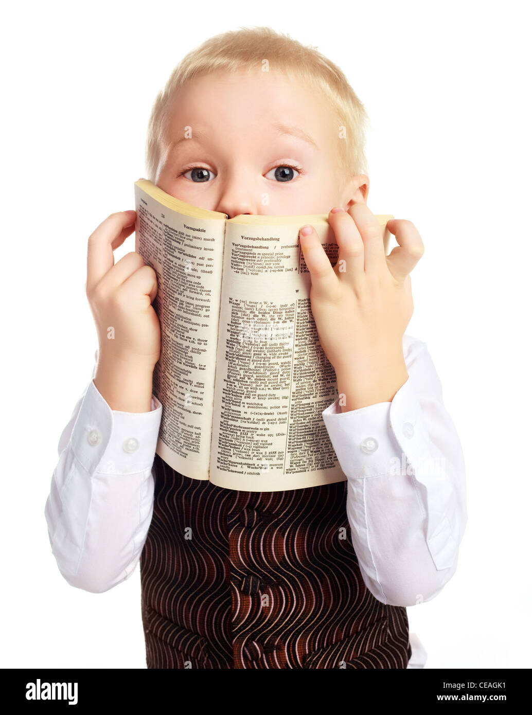 little boy with a book, isolated against white background Stock Photo ...