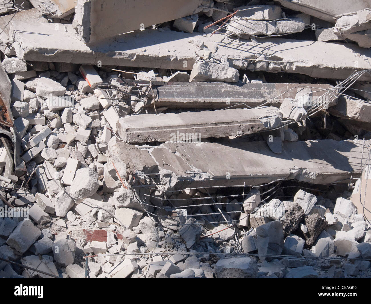 Crushed concrete and support rods from a demolished building Stock ...