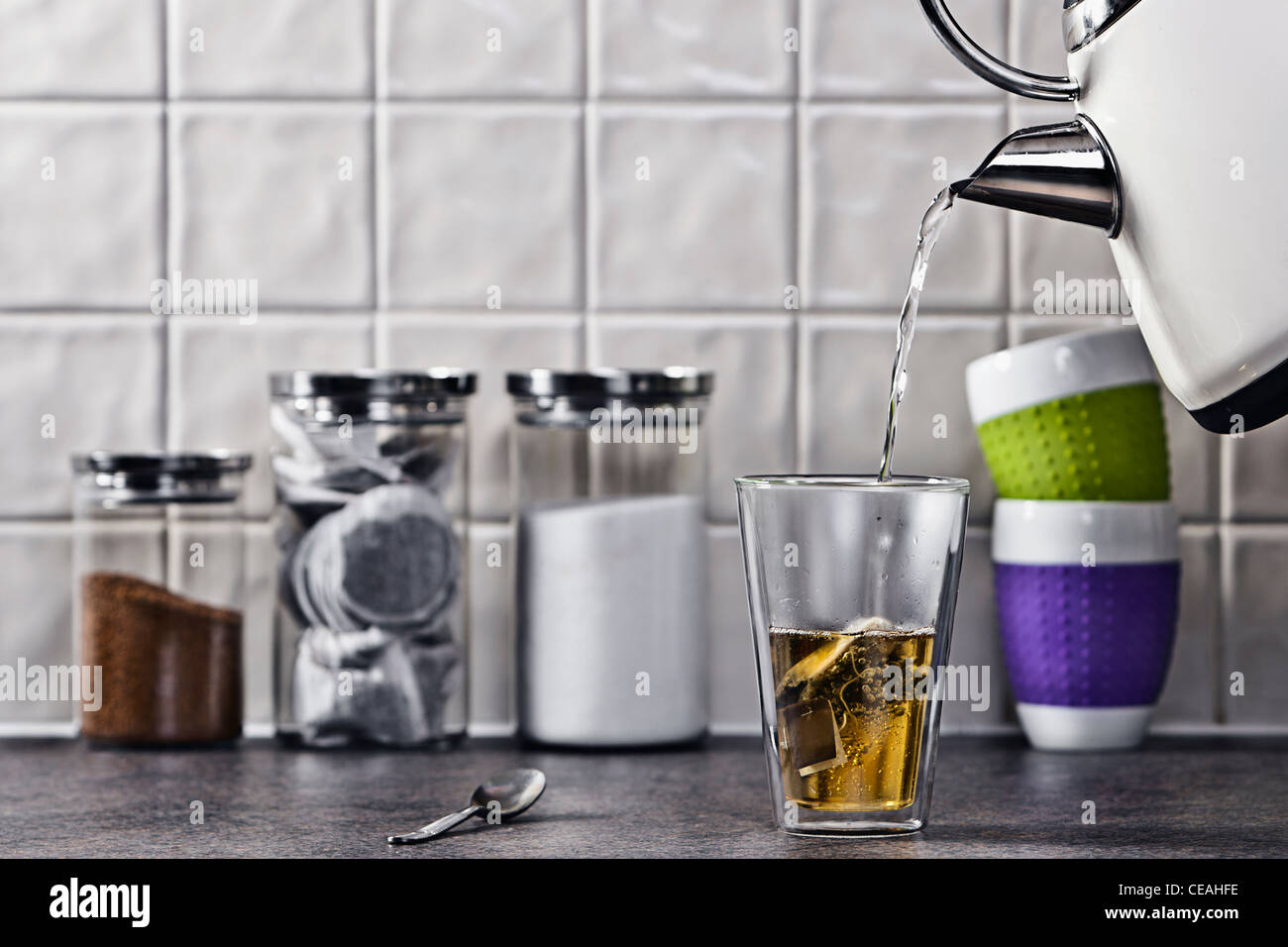 Pouring a Cup of Tea Stock Photo - Alamy