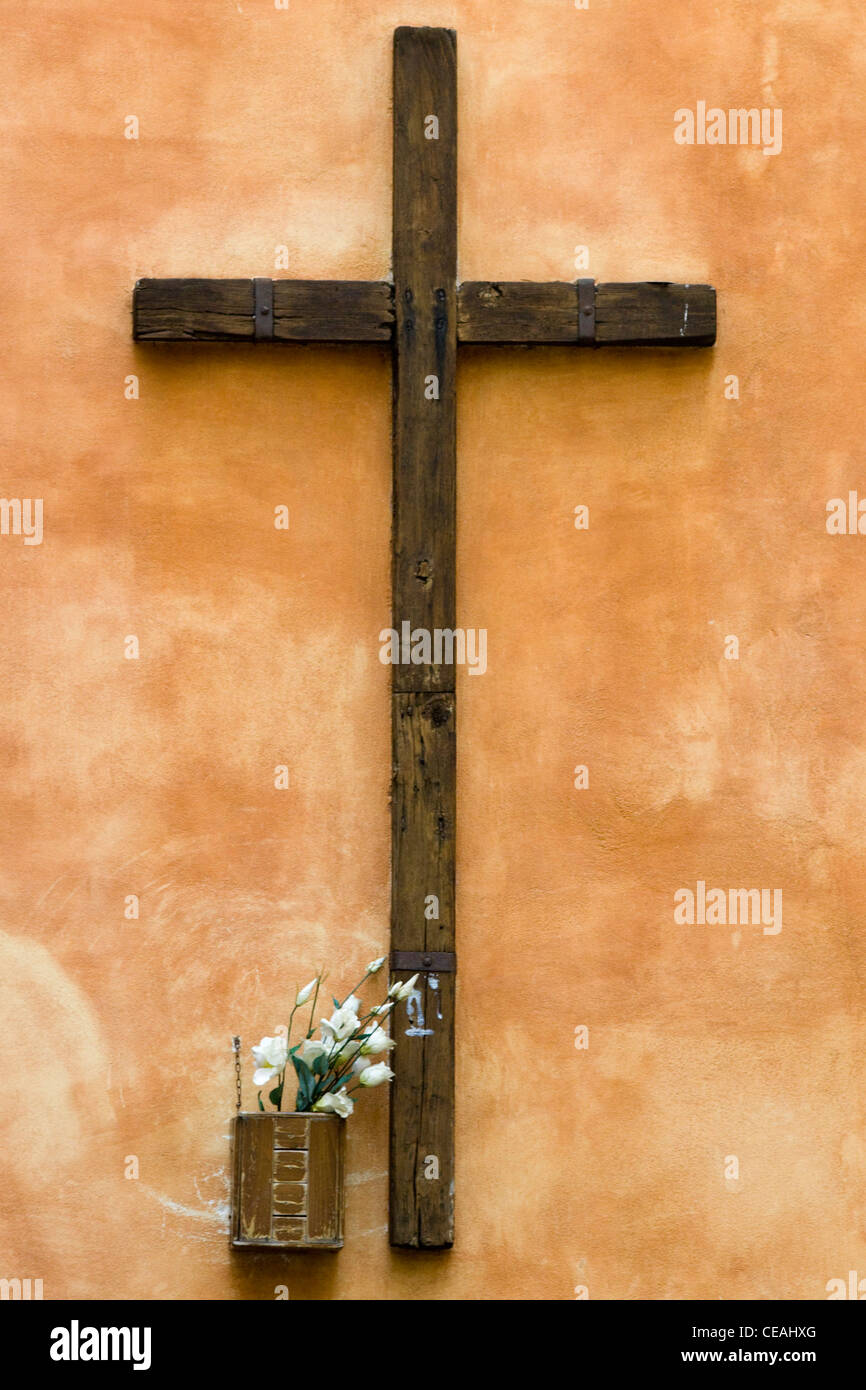 Wooden Christian cross on a wall in Rome Italy Stock Photo - Alamy