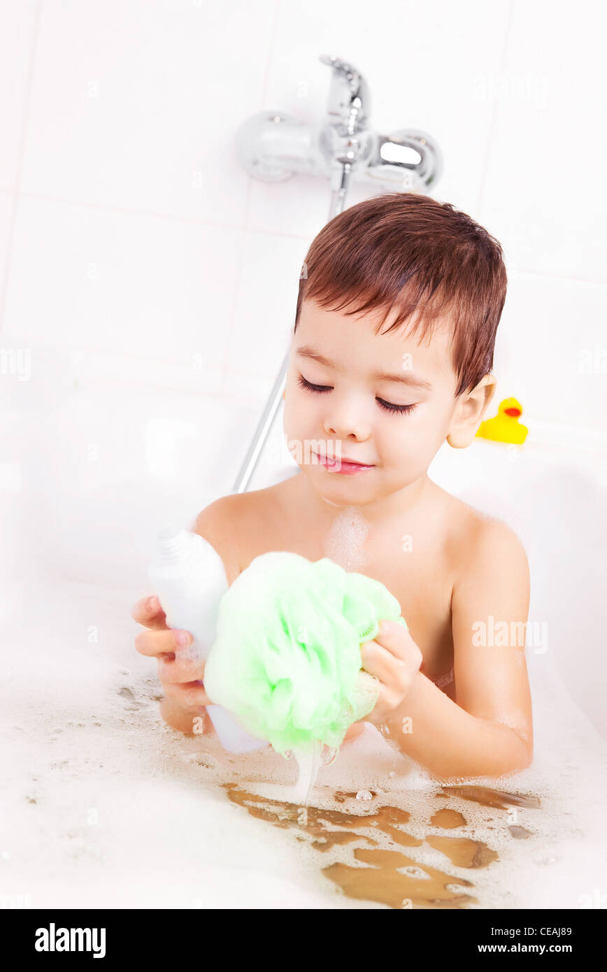 happy little boy taking a bath with foam Stock Photo - Alamy