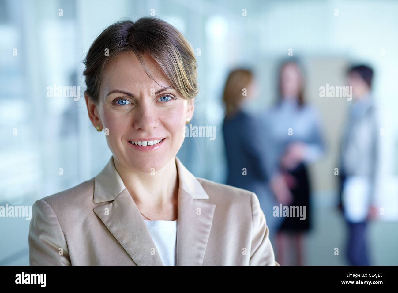 Image of pretty business leader looking at camera Stock Photo - Alamy