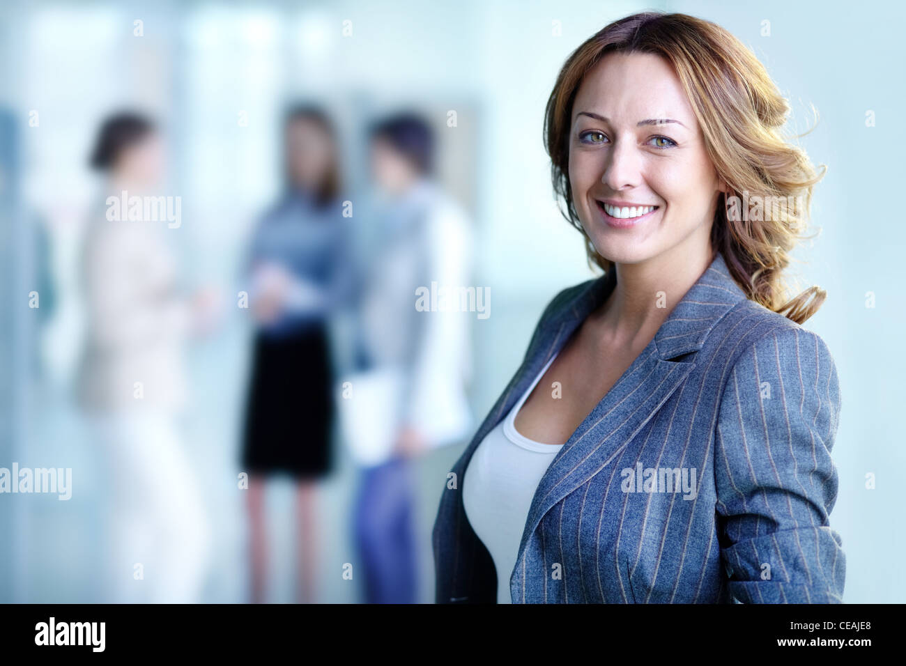 Image of pretty business leader looking at camera Stock Photo - Alamy