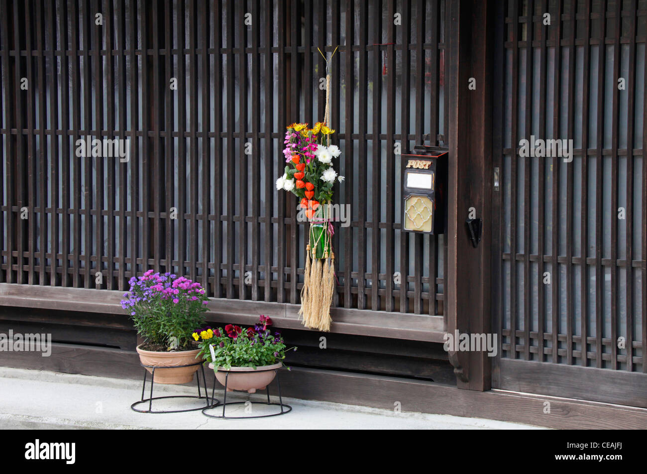 Ornament flowers on lattice windows of a house at Narai-juku Nagano ...