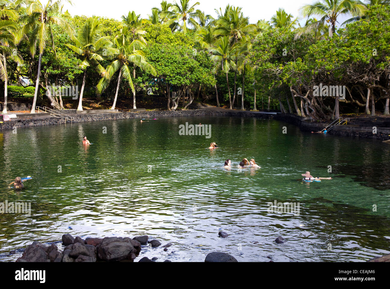Bathers enjoy a soothing soak at this hot pond at Kapoho Point on Big ...