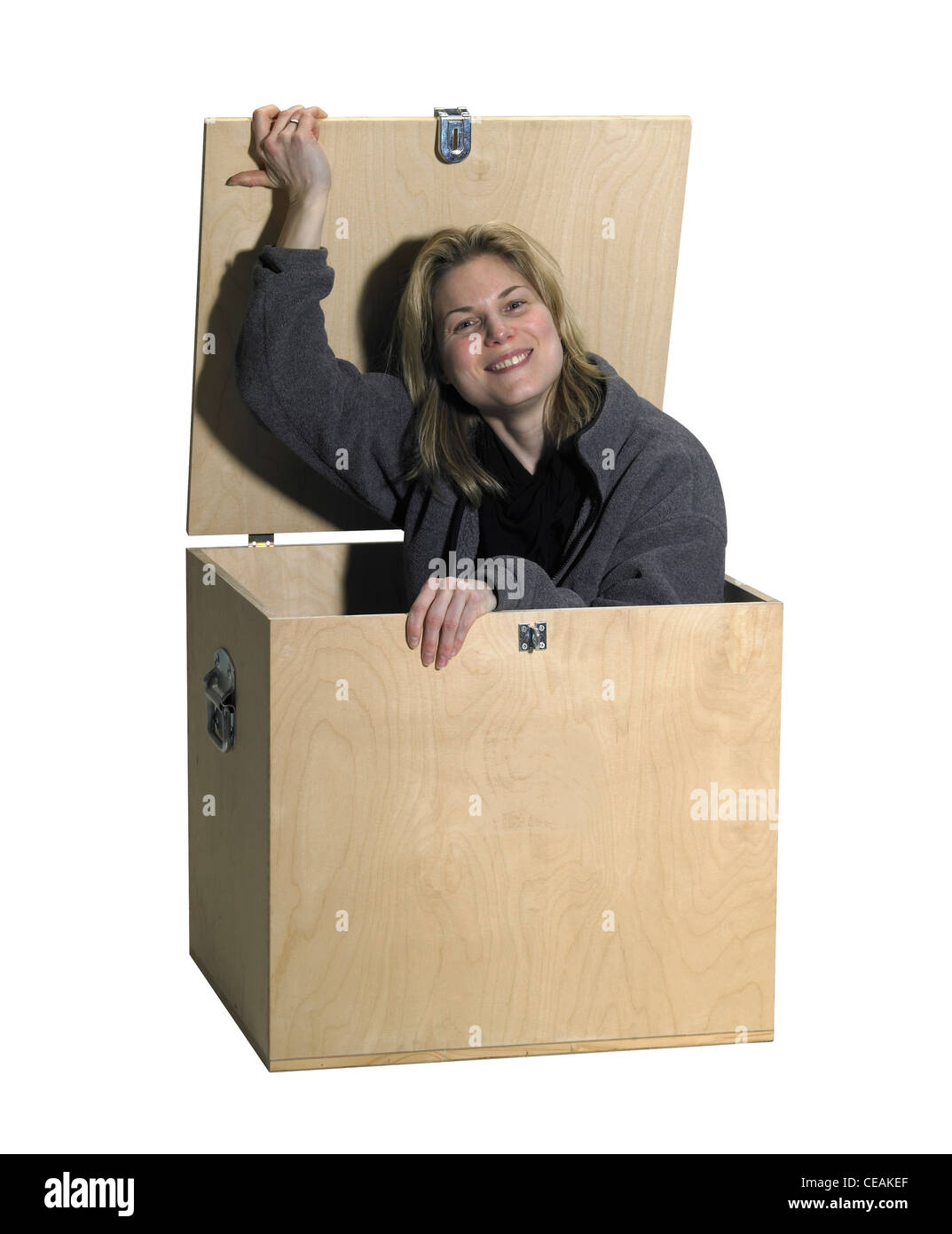 Girl inside a box Cut Out Stock Images & Pictures - Alamy