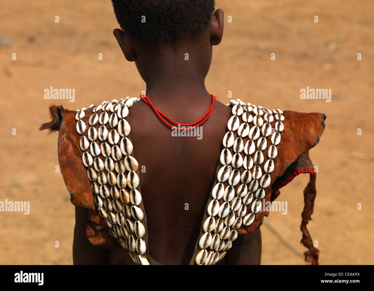 Back Of Young Tsemay Girl Top Cloth Made Of Cowry Shells And Skin ...