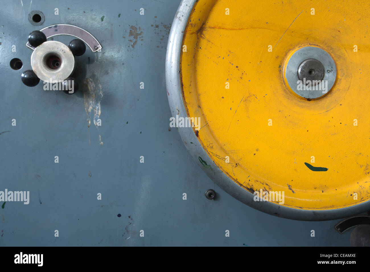 Just one part of a machine as a background. Metal texture in yellow and ...