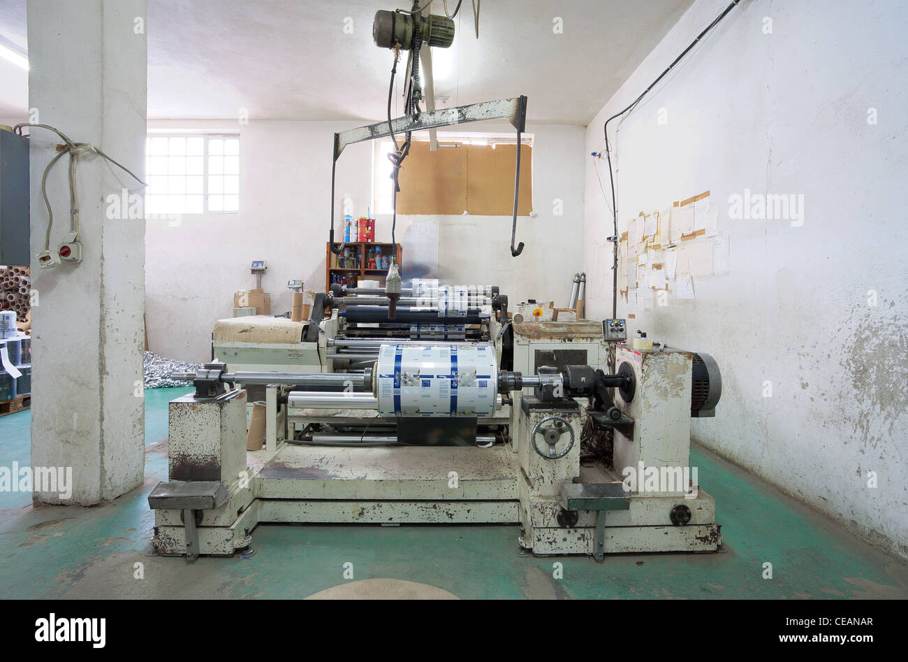 Interior of a factory, old machine for printing Stock Photo - Alamy