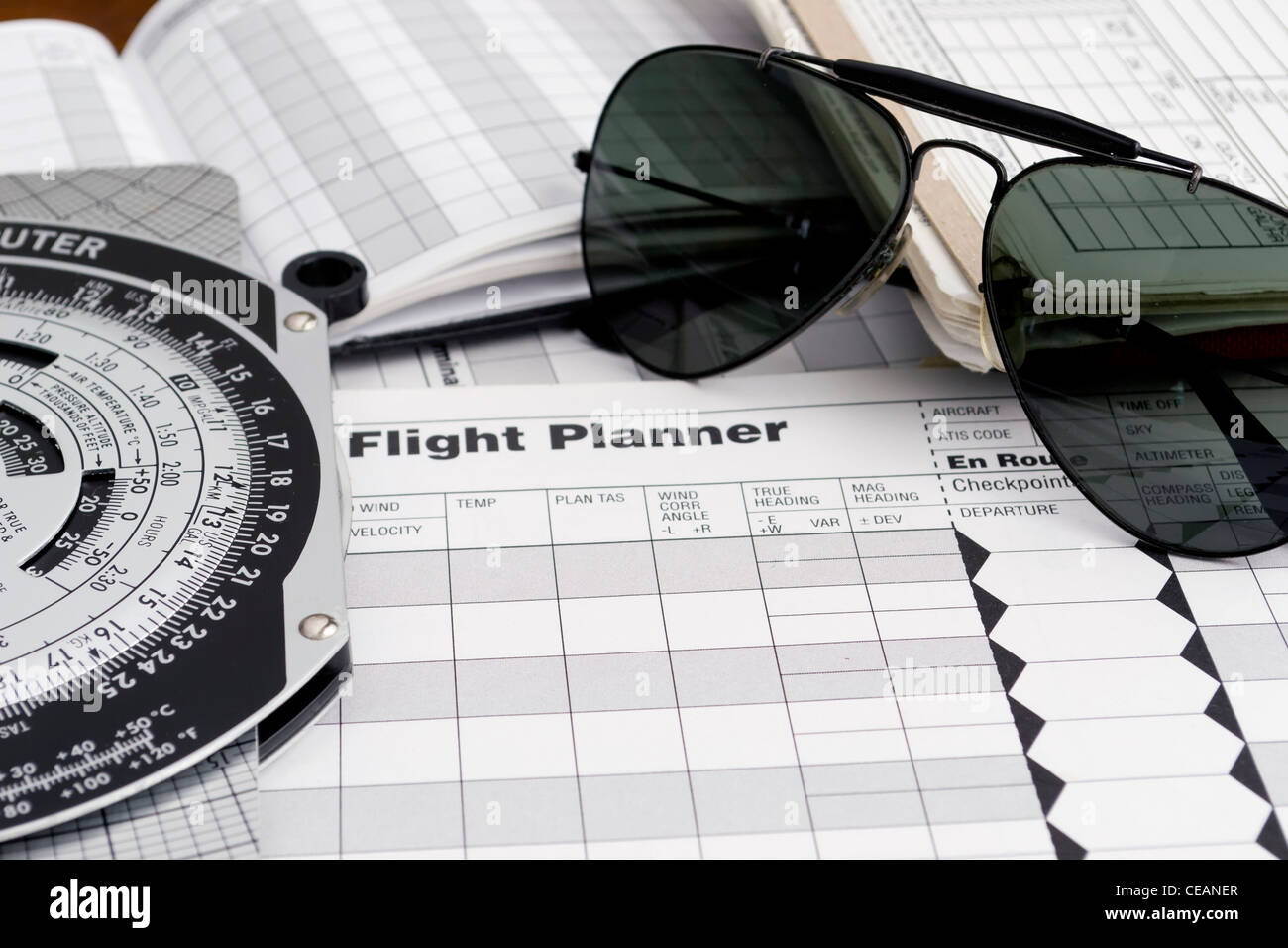 pilot style sunglasses on a flight plan paper Stock Photo - Alamy