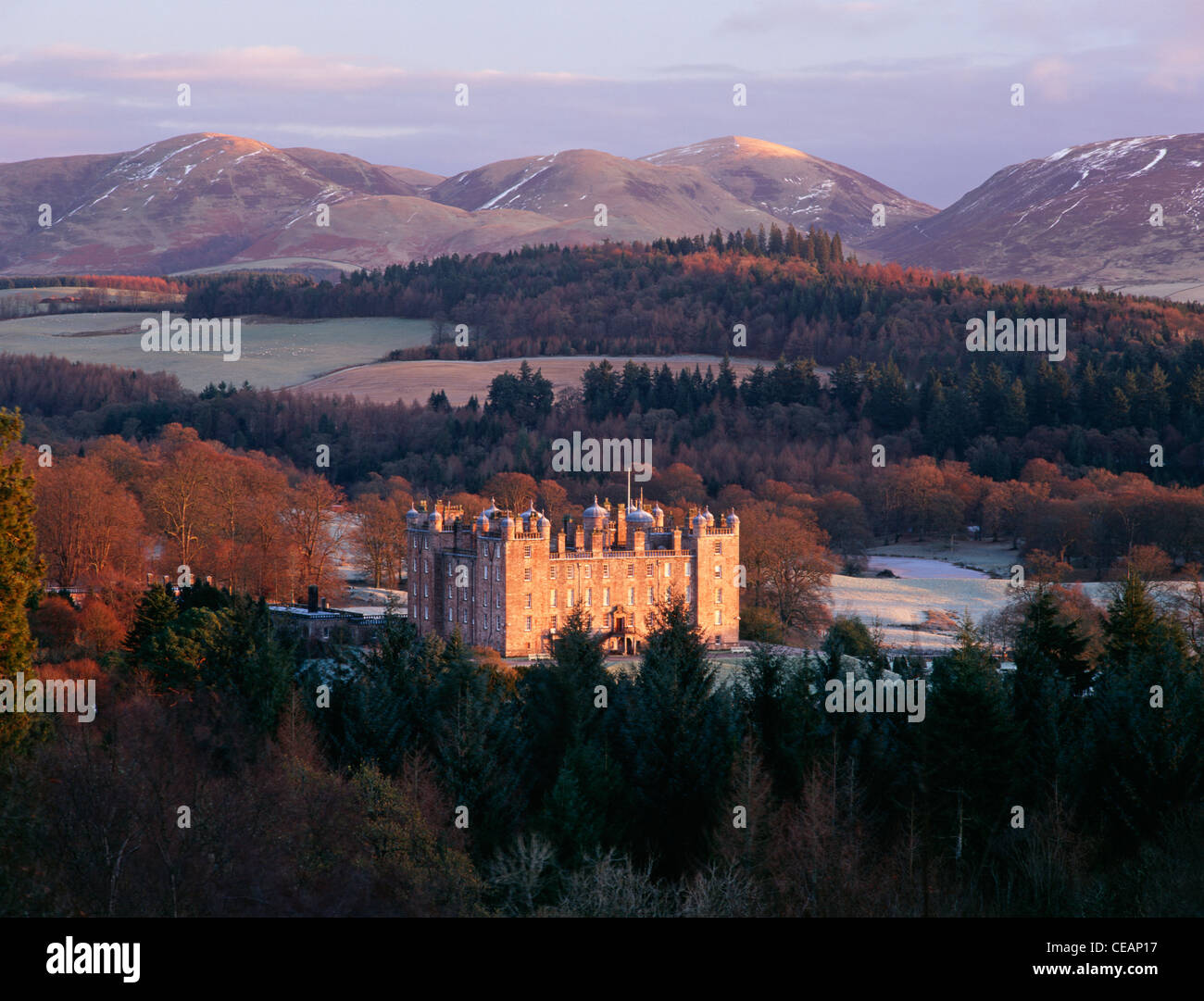 Sunrise winter snow on the Lowther Hills behind Drumlanrig Castle in ...