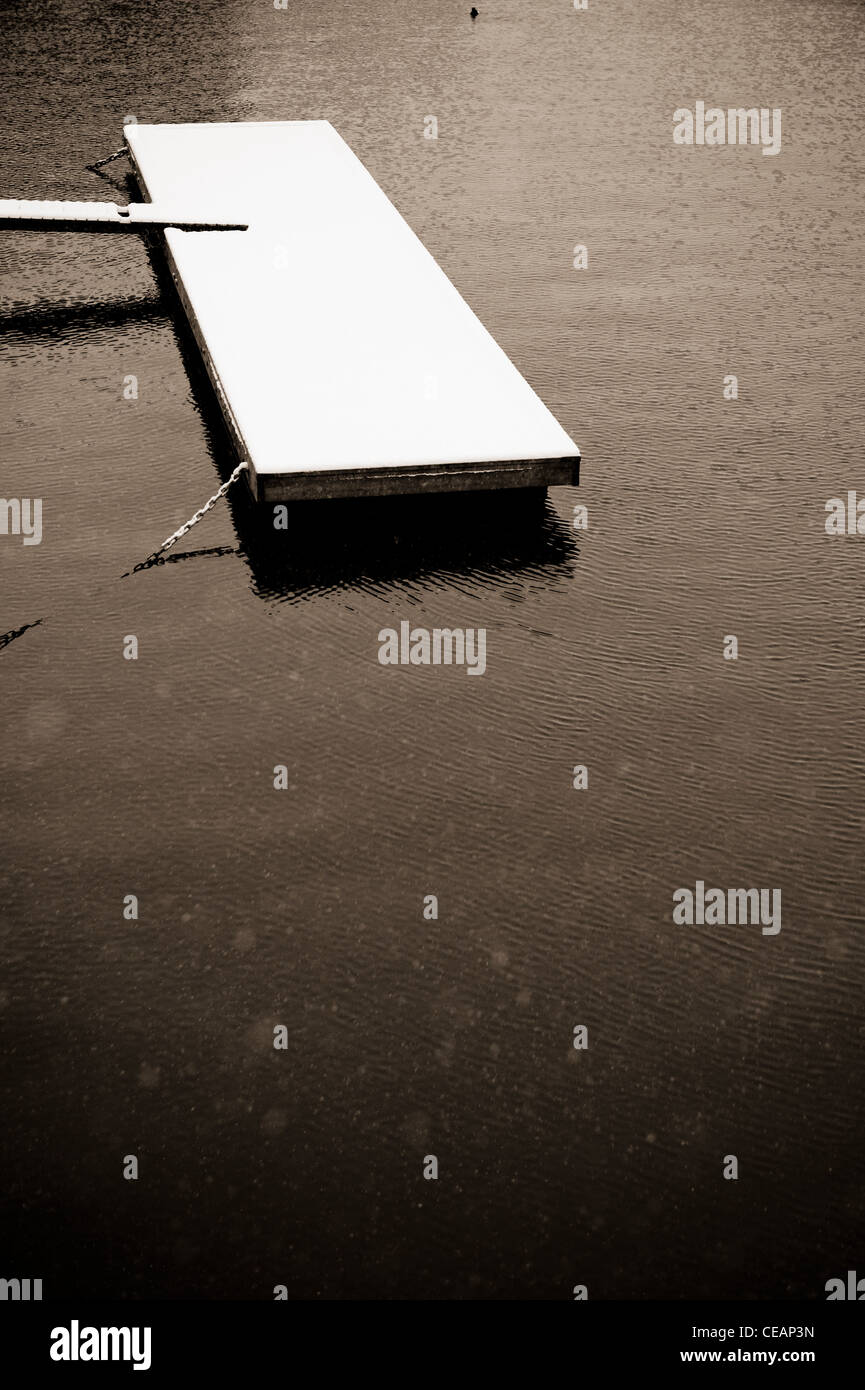 Jetty covered in snow Stock Photo - Alamy