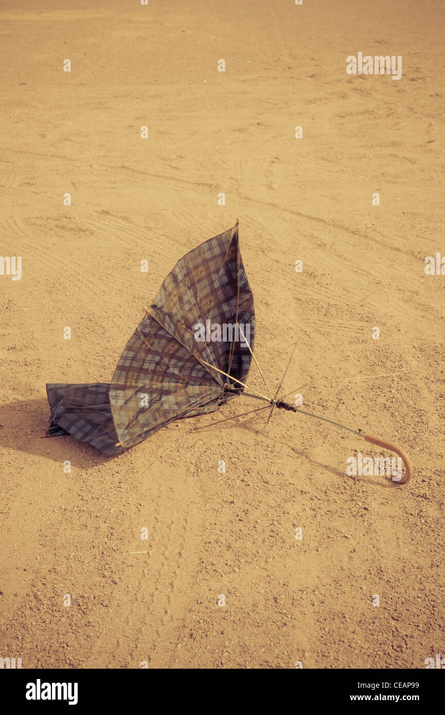 Broken umbrella hi-res stock photography and images - Alamy