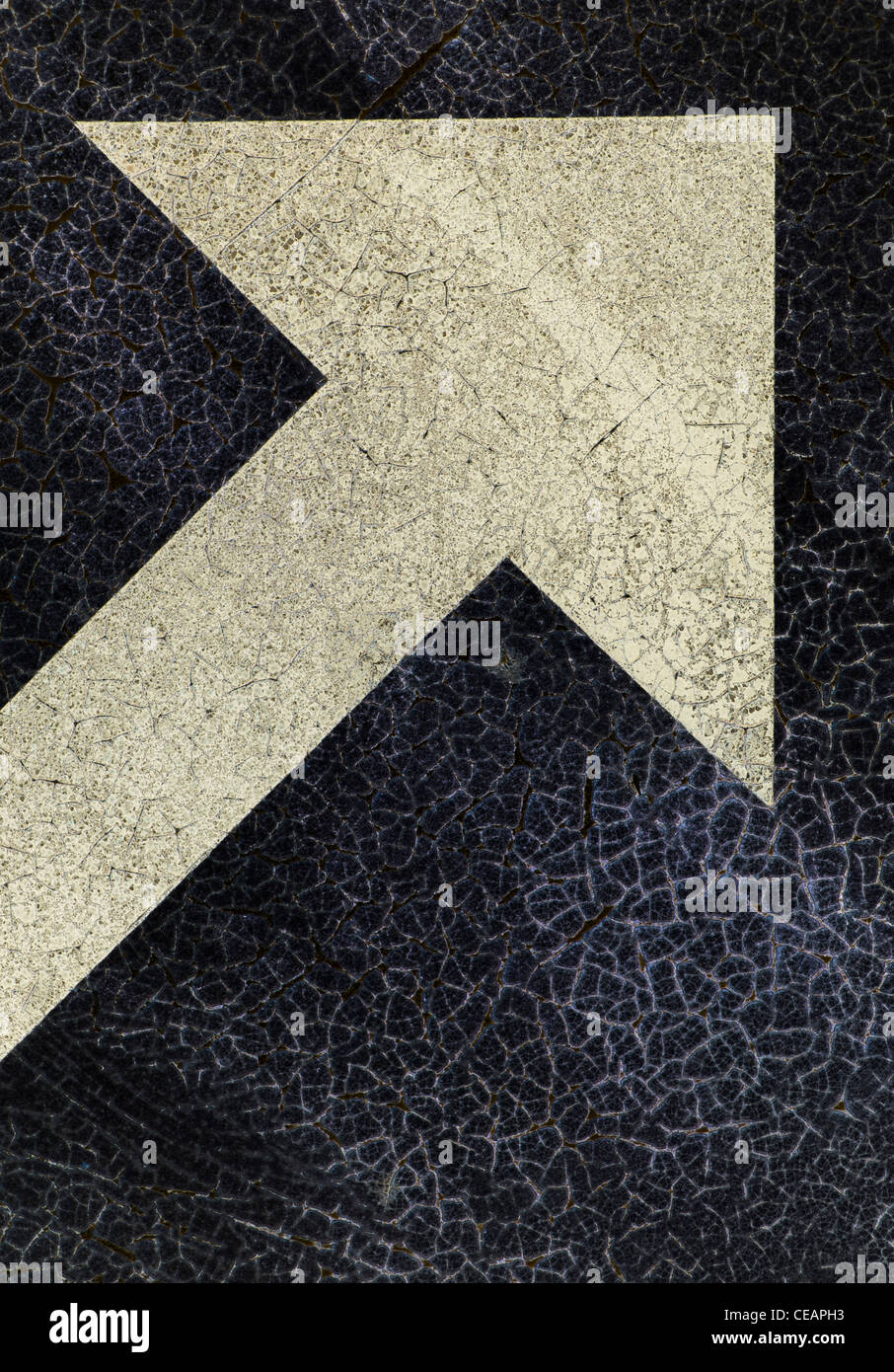 Weathered Arrow Sign Stock Photo - Alamy