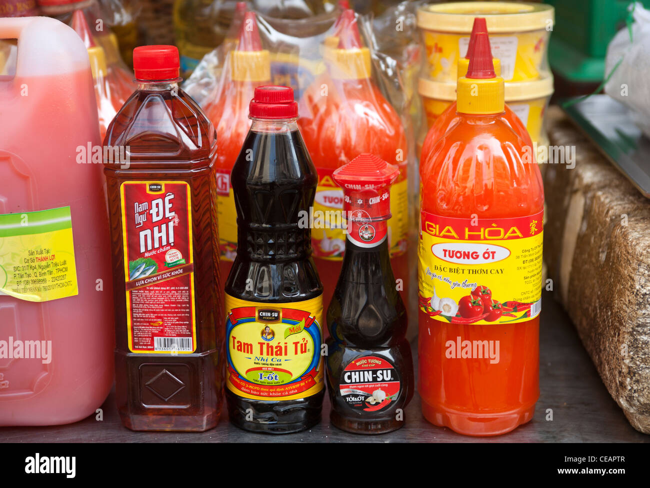 Chilli Sauces on sale at Binh Tay Market Chinatown Cholon Stock Photo ...