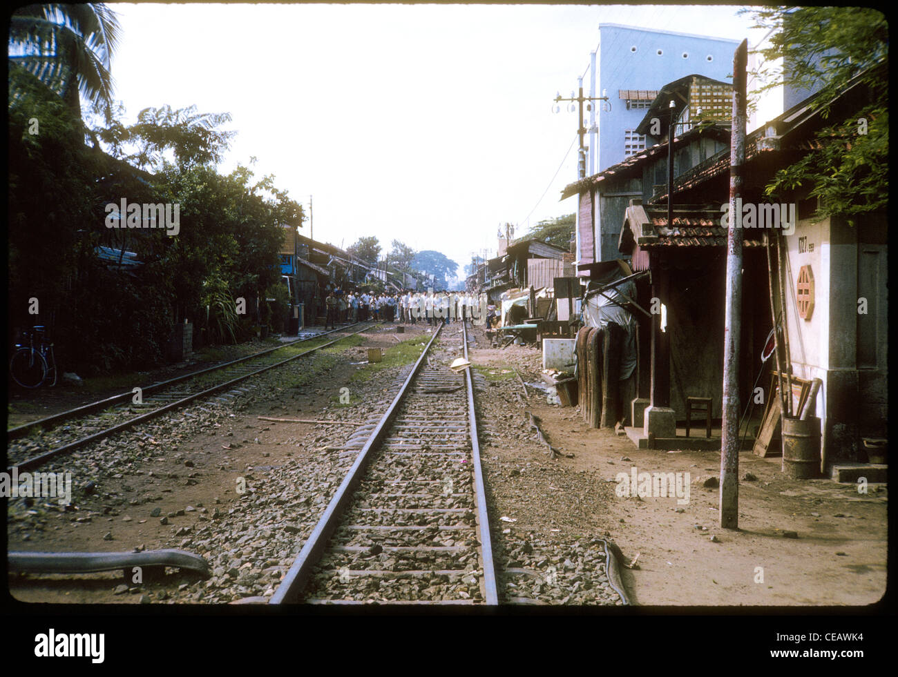 Vietnamese protesters gather along tracks during riots in Saigon ...