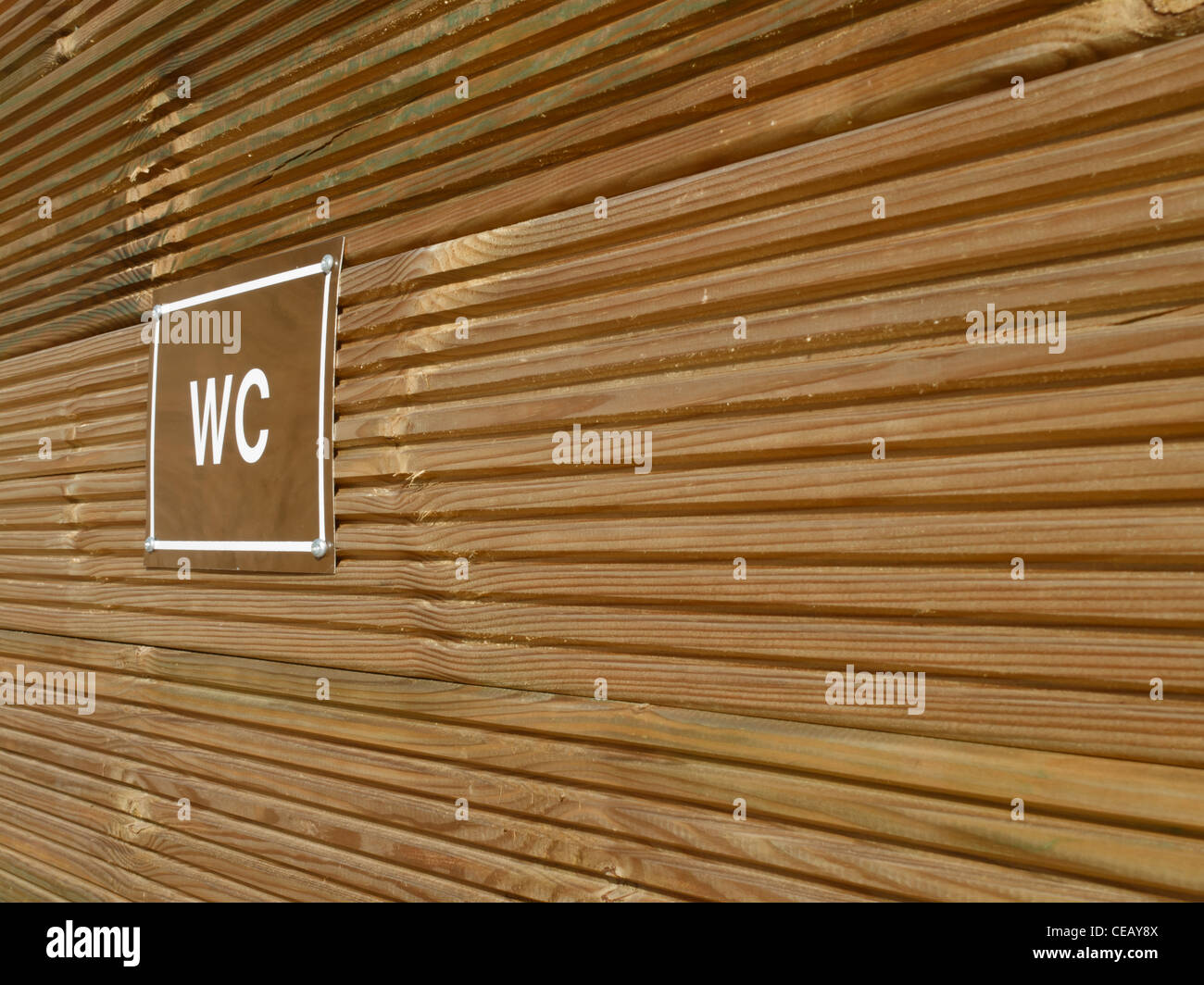 Portable, temporary individual toilet booth labelled "WC" as they are ...