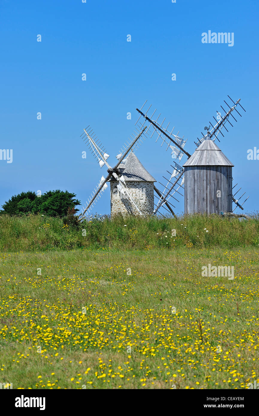 Two traditional windmills at the Pointe du Van, Finistère, Brittany ...