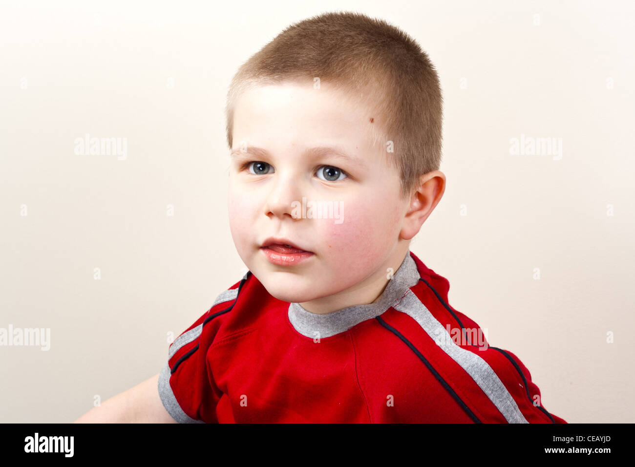 portrait of little boy in red shirt Stock Photo - Alamy