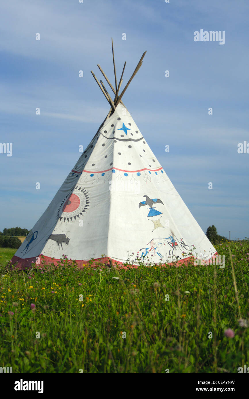 tipi on green meadow on background of blue sky Stock Photo - Alamy
