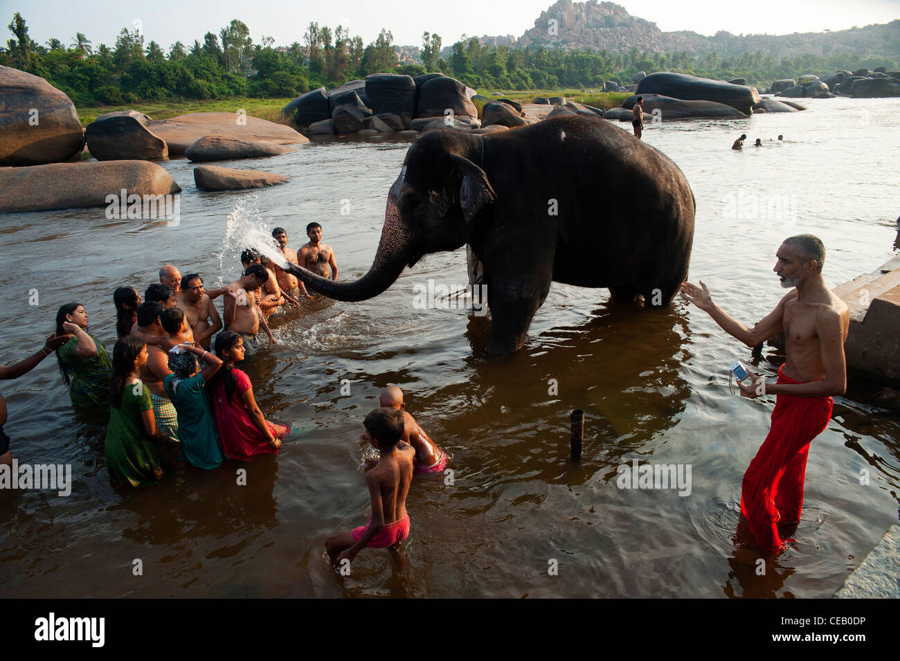 Lakshmi the famous Hampi elephant bathing people on the Tungabhadra ...