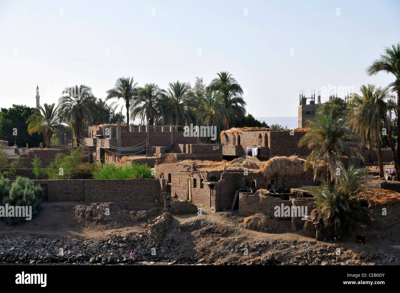 River Nile homes on the side of the Nile Egypt Middle East Stock Photo - Alamy