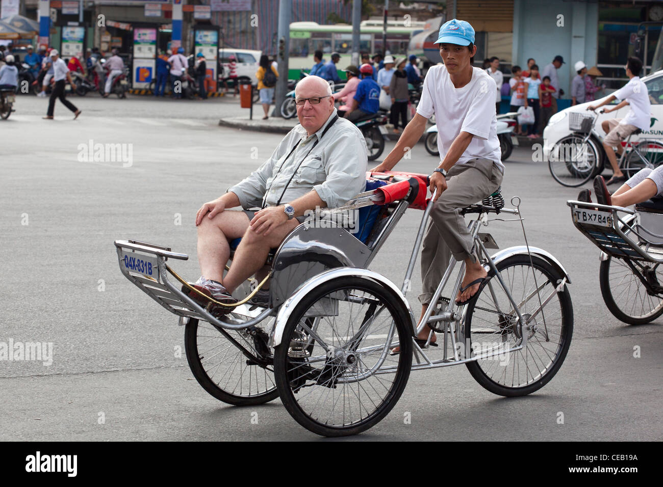 Tourist on cycle rickshaw Ho Chi Minh City Vietnam Stock Photo - Alamy