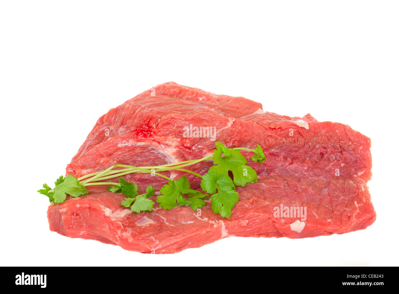 piece of raw red meat isolated on white background Stock Photo - Alamy