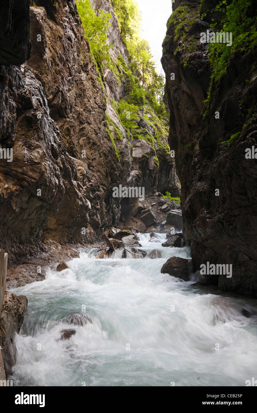 White water near one of the waterfalls in the Partnach Gorge ...