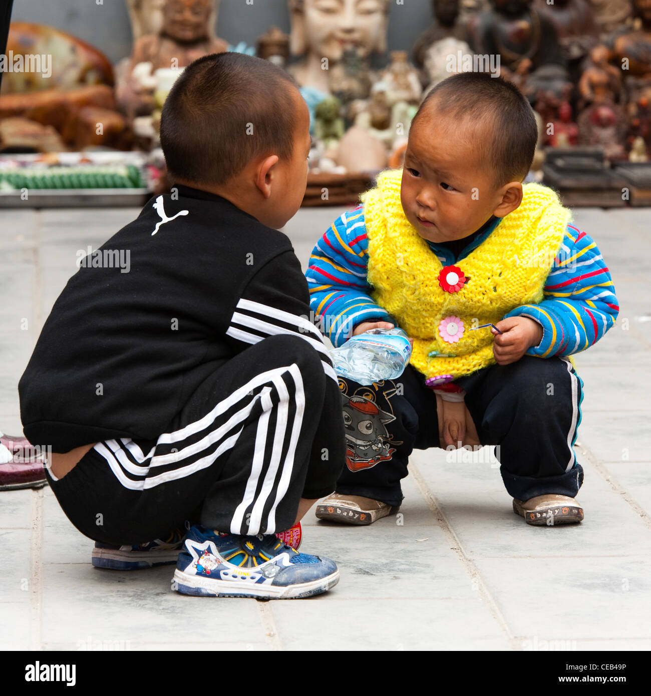 Kids wearing typical open trousers, Panjiayuan flea market, Chaoyang ...