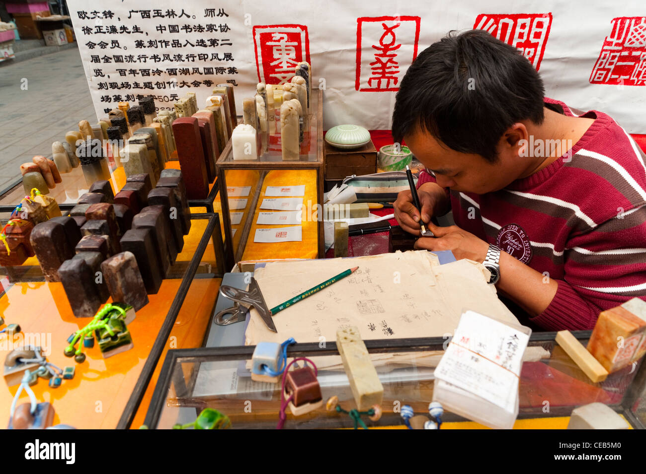 Stone carver, traditional chinese stamp shop, Panjiayuan flea market ...