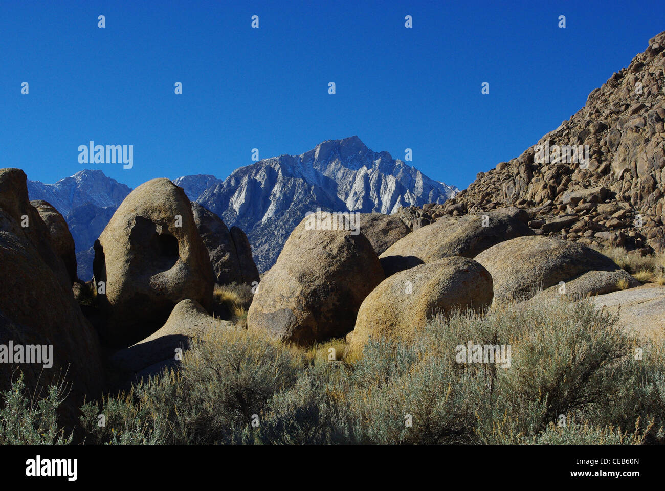 Rocks and High Sierra Nevada peaks, Alabama Hills, California Stock ...