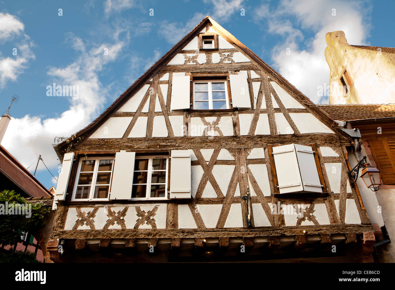 Old timbered frame house in Riquewir village in Alsace France Stock ...