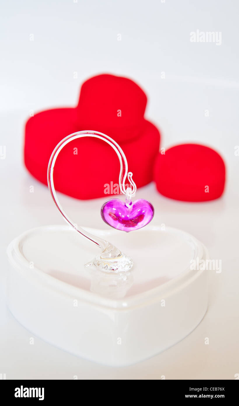 violet heart shape on white background Stock Photo - Alamy