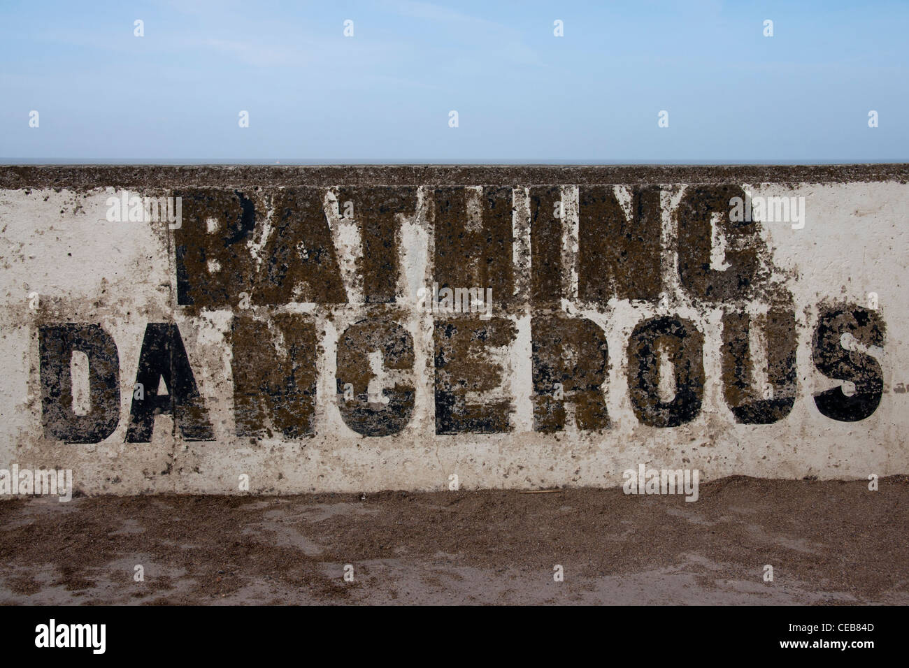 Danger sign on a wall Stock Photo - Alamy