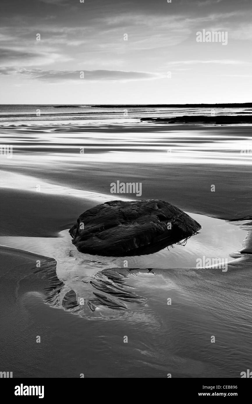 Rock on low tide Black and White Stock Photos & Images - Alamy