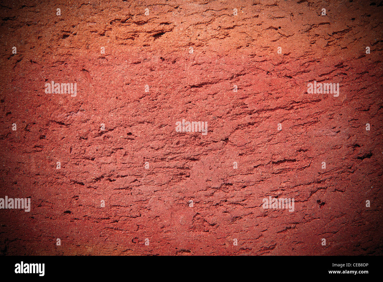 red rough background with black shadows in narrows Stock Photo - Alamy