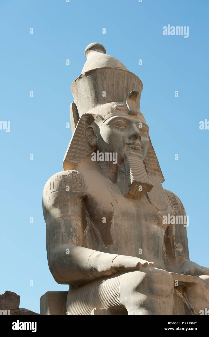 Large ancient statue of Ramses II at Luxor temple in Egypt Stock Photo ...