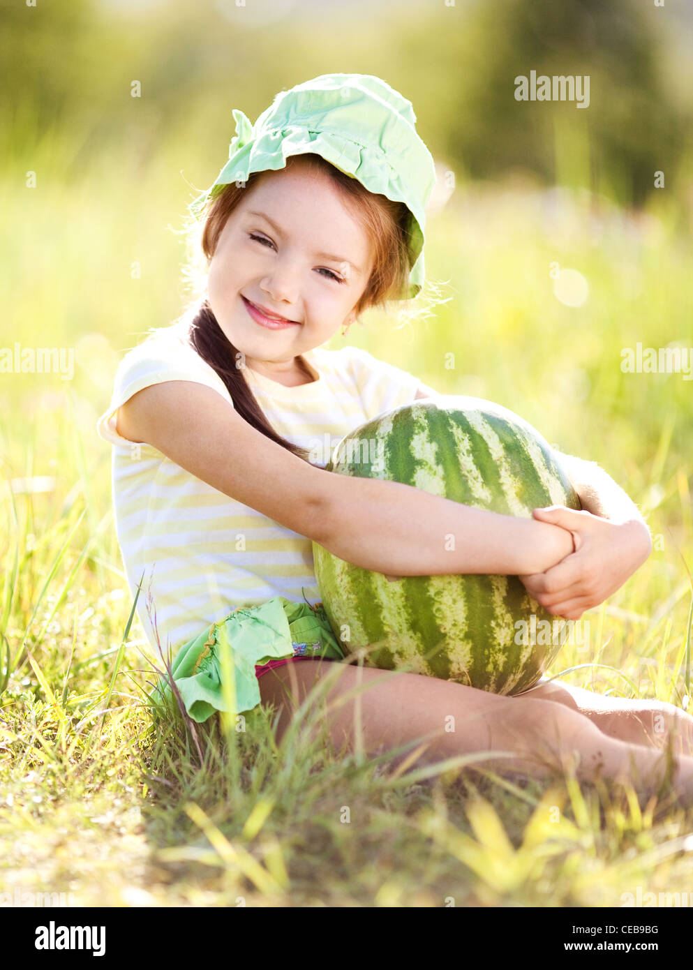 Happy child big watermelon hi-res stock photography and images - Alamy