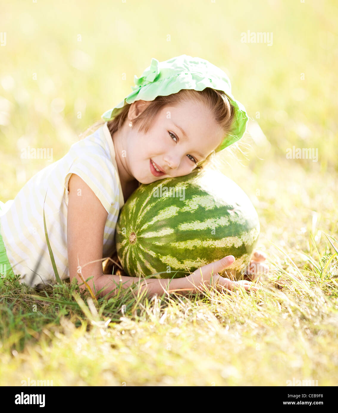 Happy child big watermelon hi-res stock photography and images - Alamy