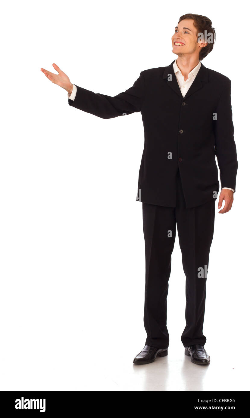 Young confident business man standing and smiling making presentation ...